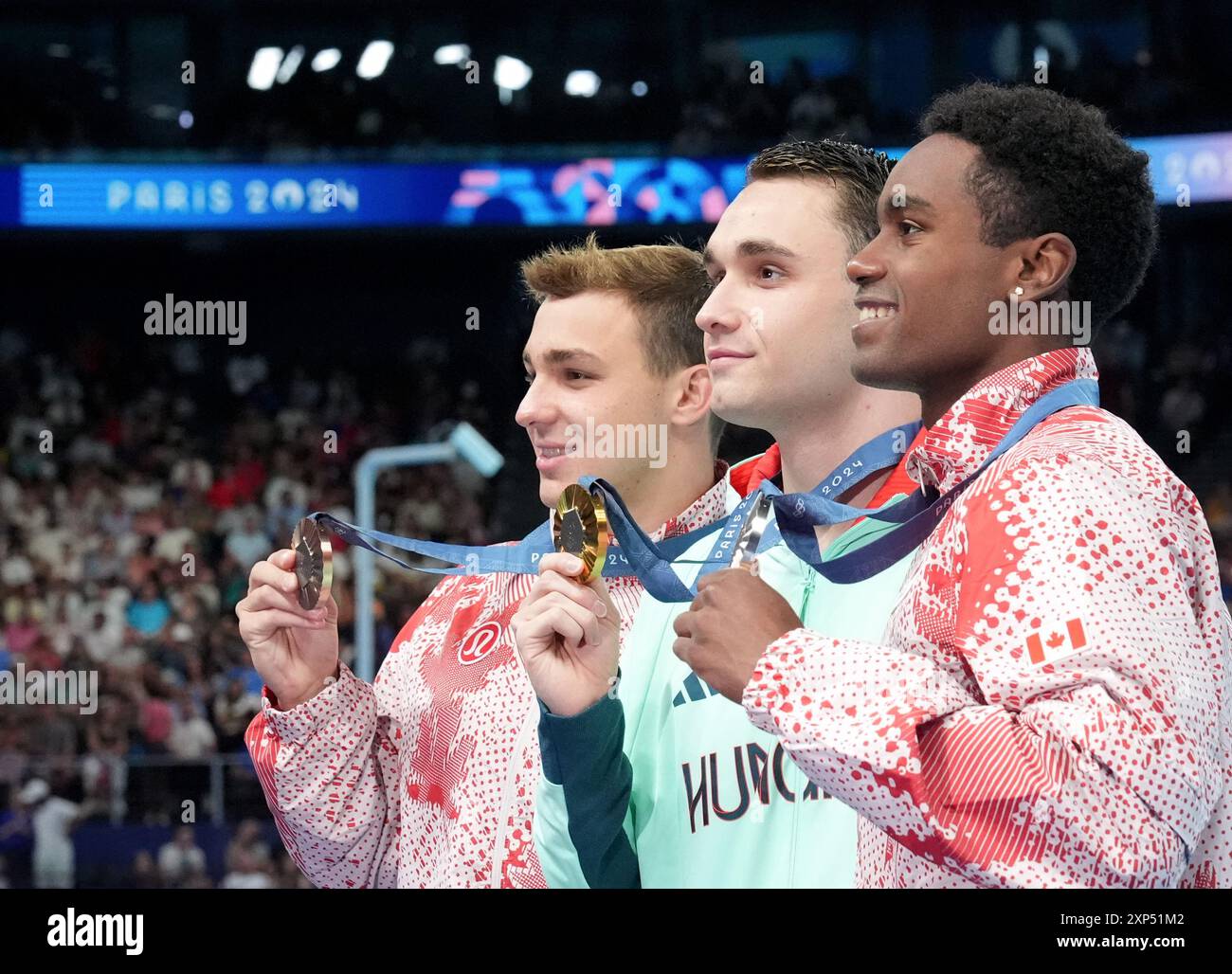 Paris, France. 03rd Aug, 2024. Kristof Milak of Hungary, Ilya Kharun of Canada and Josh Liendo ...