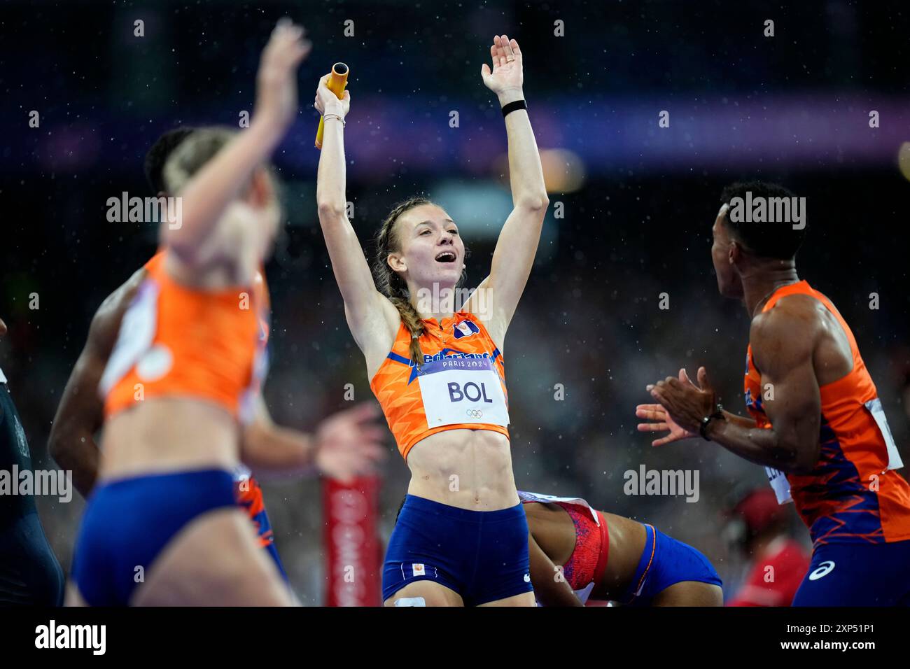 Femke Bol, of the Netherlands, celebrates was she anchors her team to ...