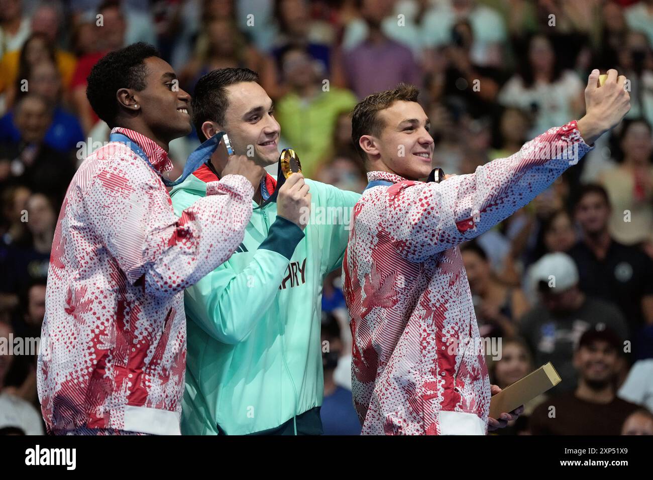 Canada's Josh Liendo, Hungary's Kristof Milak and Canada's Ilya Kharun ...