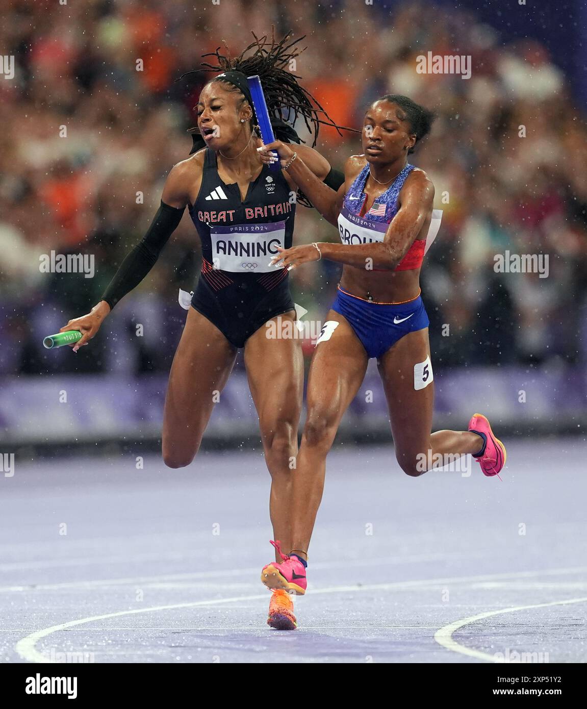 Great Britain's Amber Anning and USA's Kaylyn Brown after crossing the ...