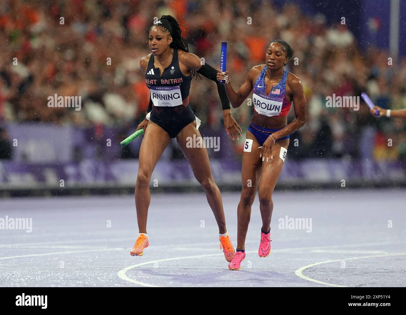 Great Britain's Amber Anning and USA's Kaylyn Brown after crossing the ...