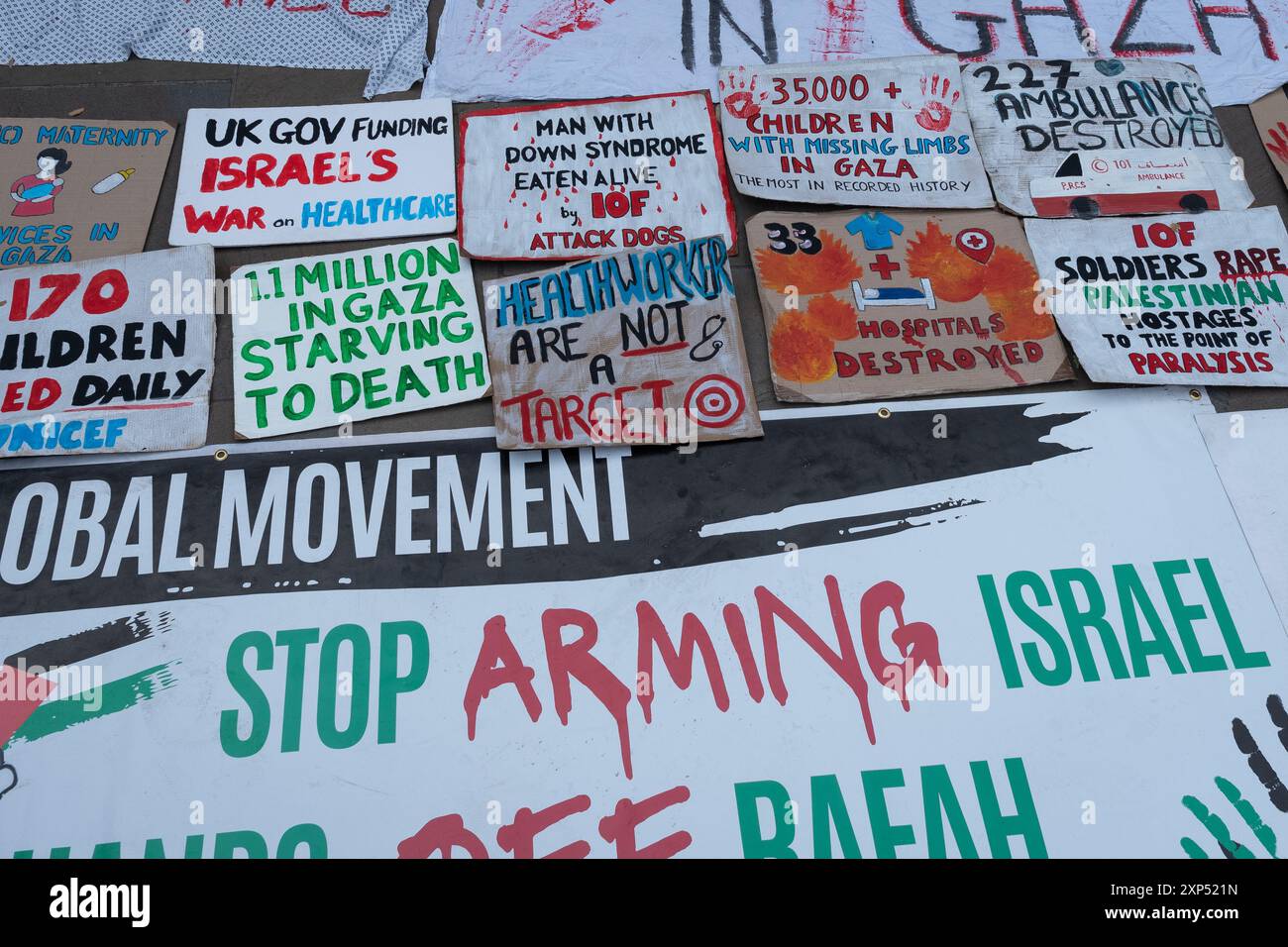 Pro palestinian demonstrators placards hi-res stock photography and ...