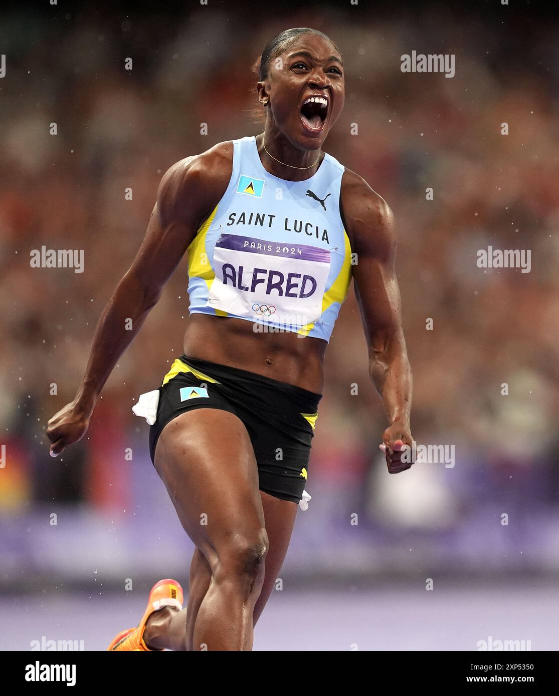 Saint Lucia's Julien Alfred celebrates winning the Women's 100m Final ...