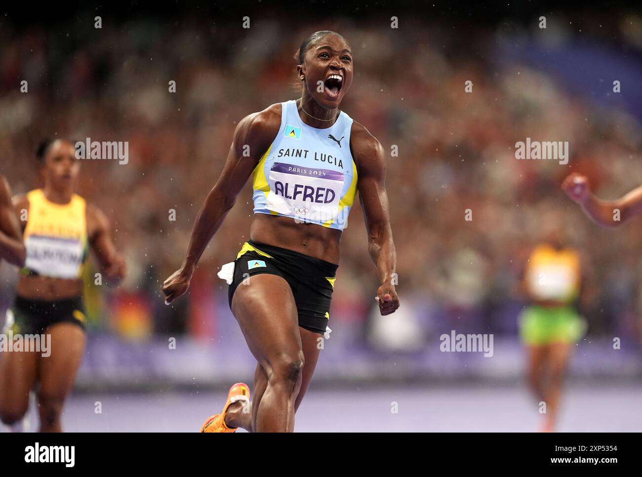 Saint Lucia's Julien Alfred celebrates winning the Women's 100m Final ...