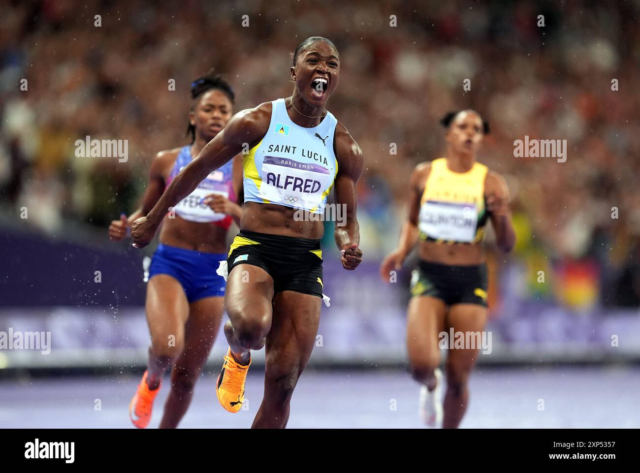 Saint Lucia's Julien Alfred celebrates winning the Women's 100m Final ...