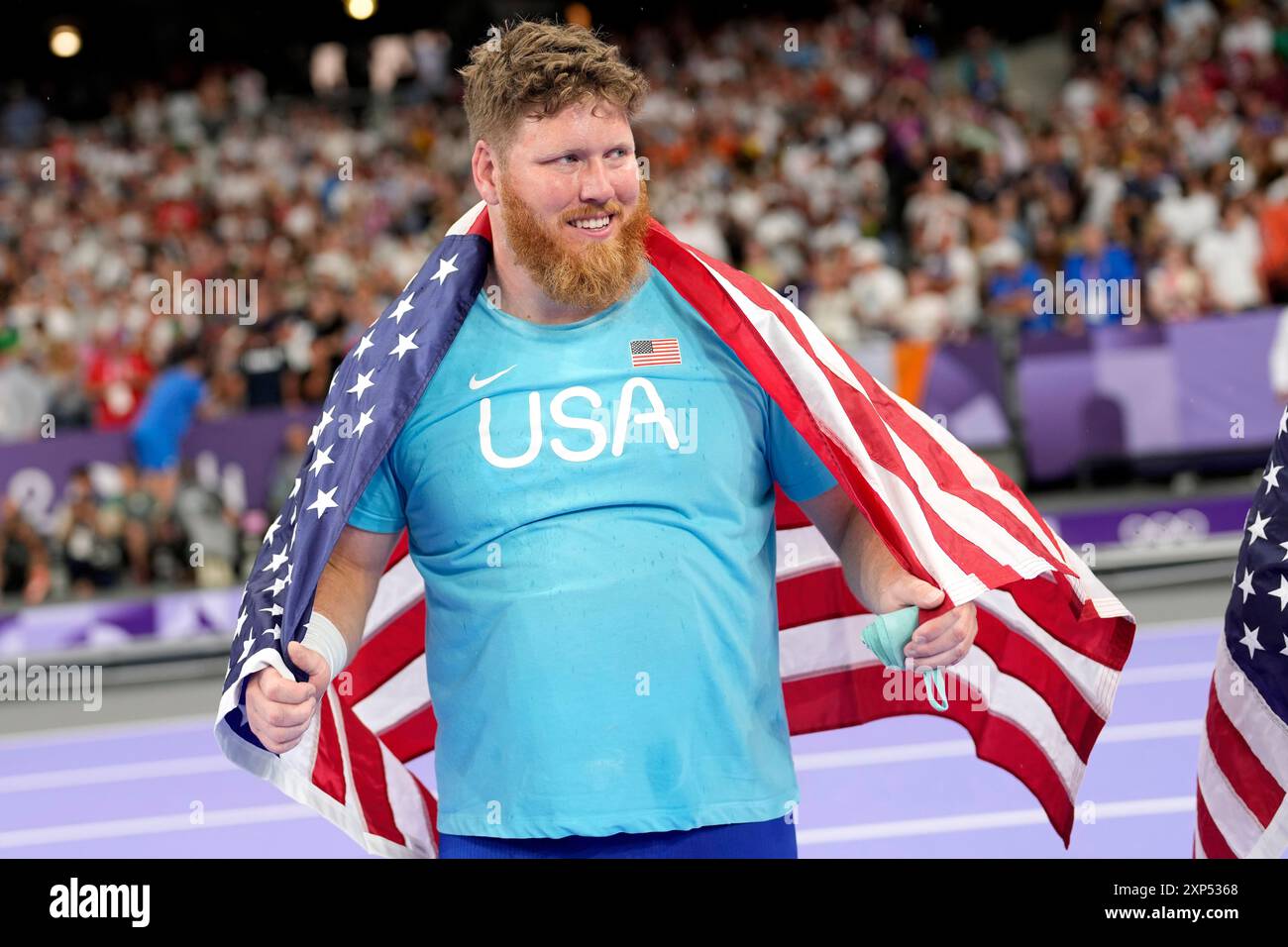 Ryan Crouser, of the United States reacts after winning the men's shot ...