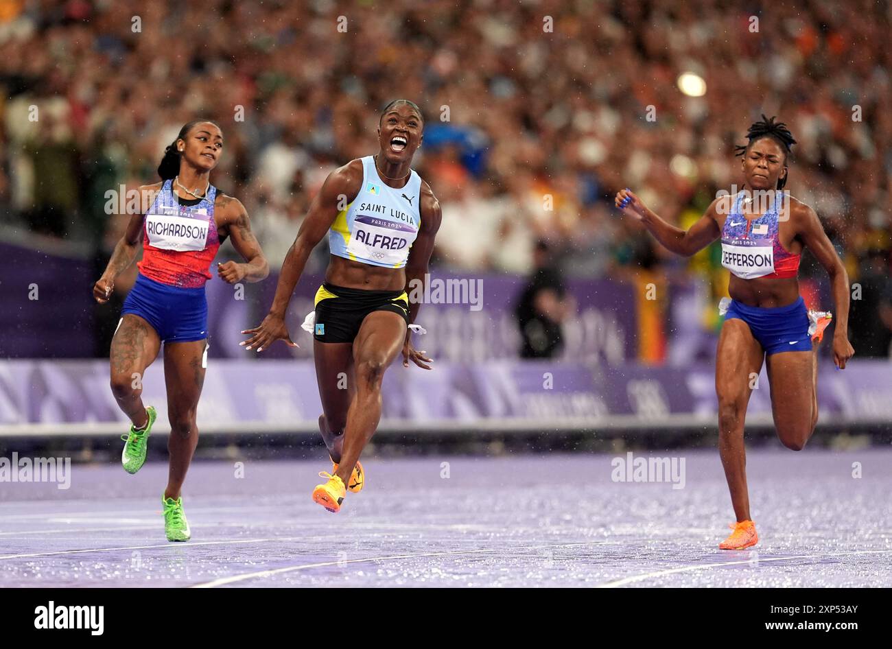 Saint Lucia's Julien Alfred celebrates winning the Women's 100m Final ...