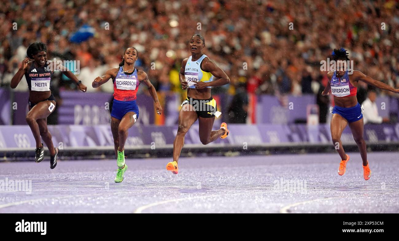 Saint Lucia's Julien Alfred crosses the line to win the Women's 100m ...
