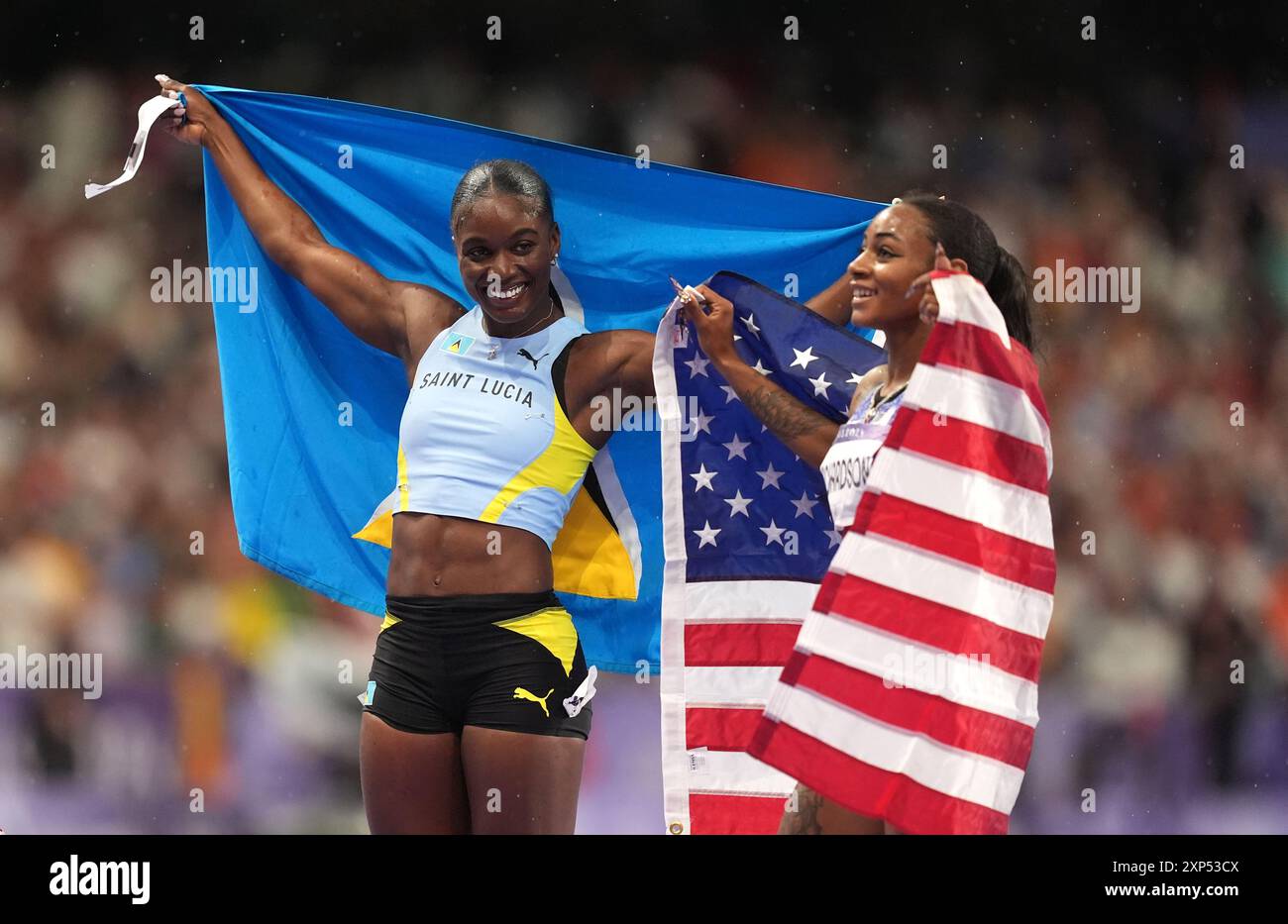 Saint Lucia's Julien Alfred celebrates winning the Women's 100m Final ...