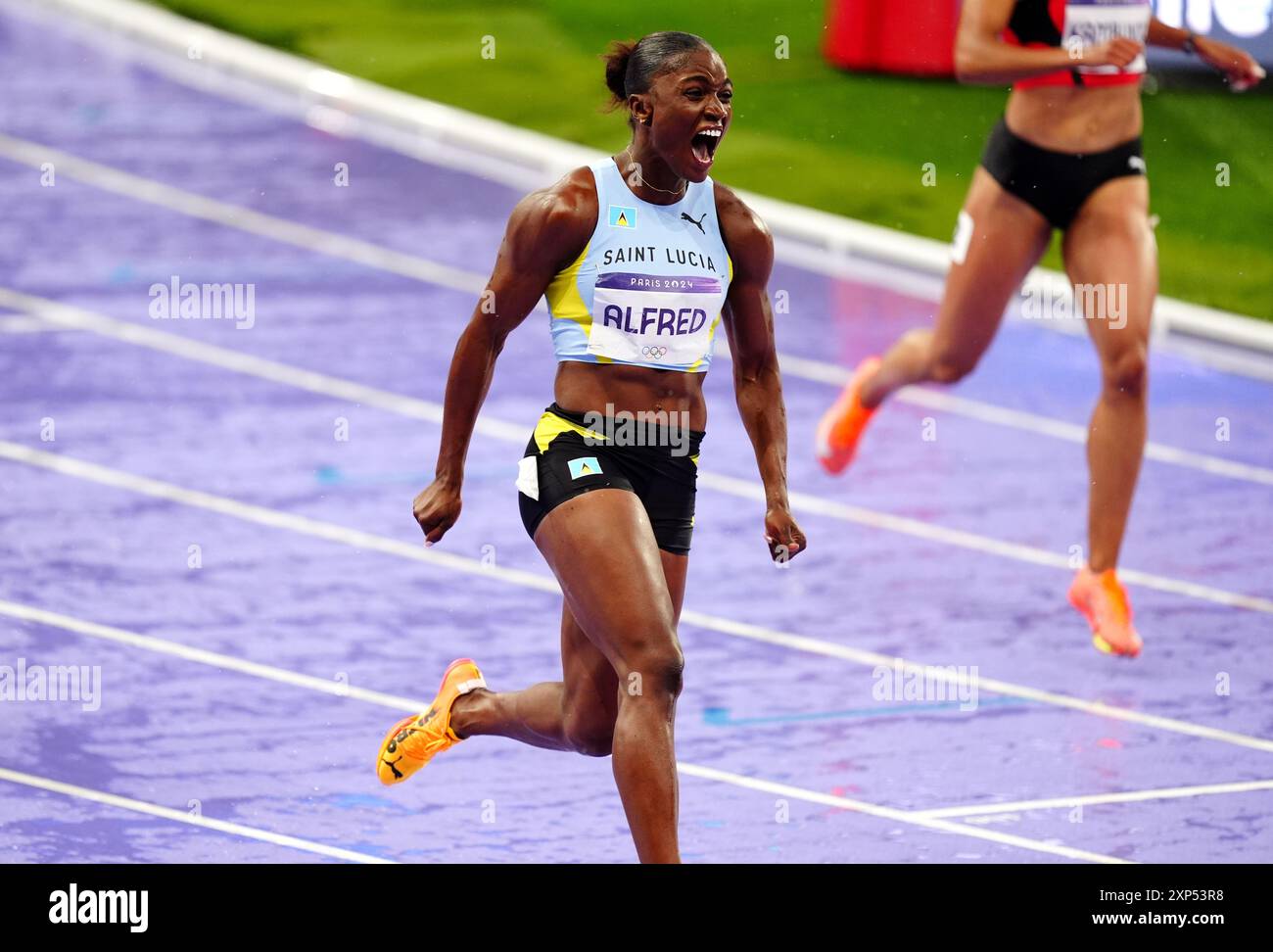 Saint Lucia's Julien Alfred celebrates winning the Women's 100m Final ...