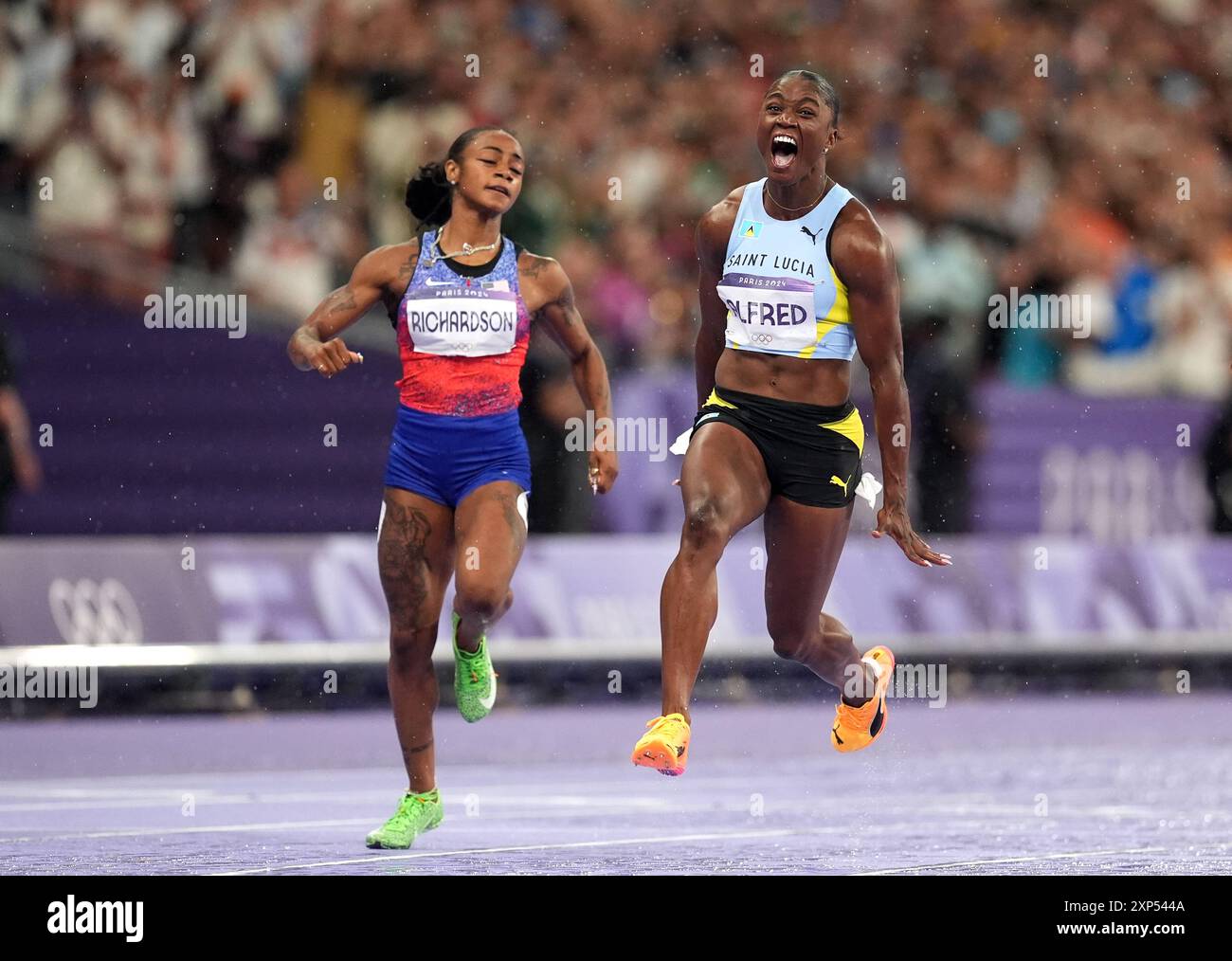 Saint Lucia's Julien Alfred celebrates winning the Women's 100m Final ...