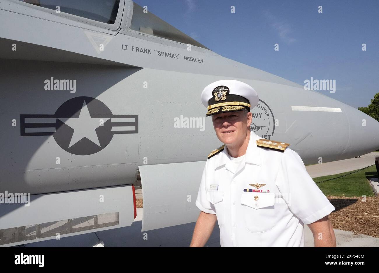 U.S. Navy Vice Admiral Francis Morley, walks past the Boeing F/A-18 E1 ...