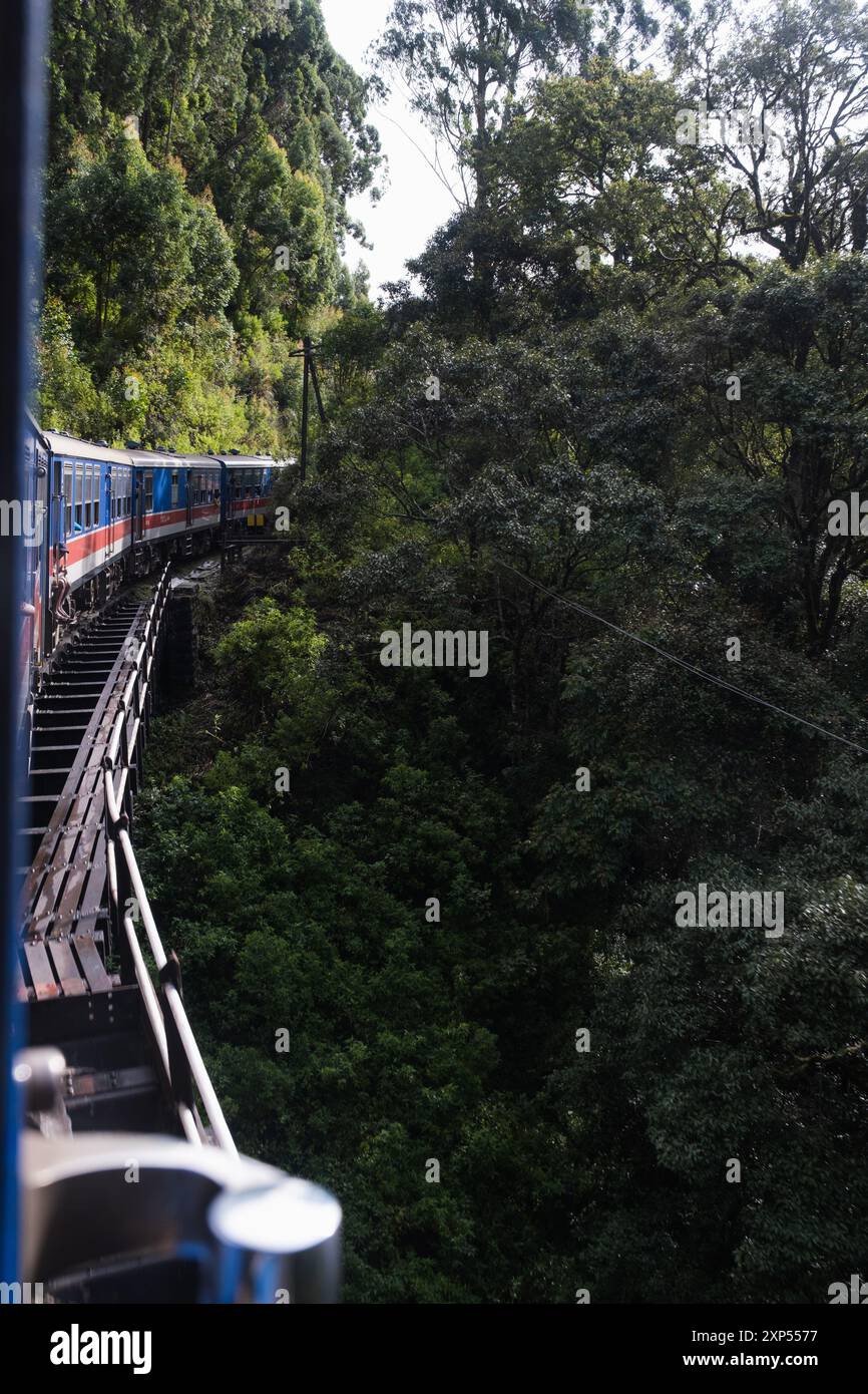 Blue train from Ella to Kandy crossing a bridge in Sri Lanka Stock ...