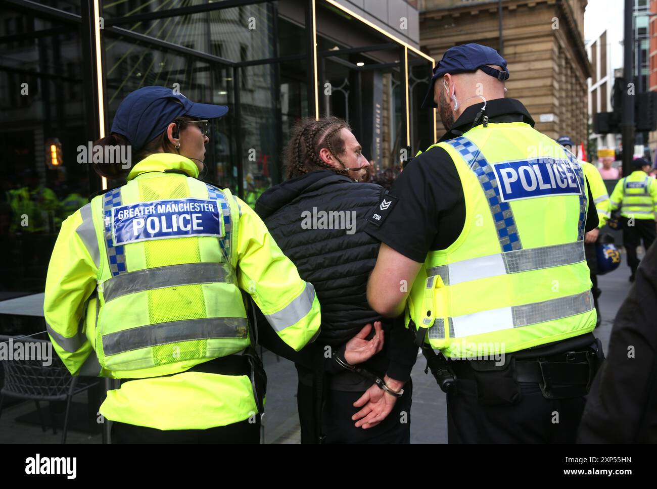 Manchester, England, UK. 3rd Aug, 2024. A nationalist protester is ...