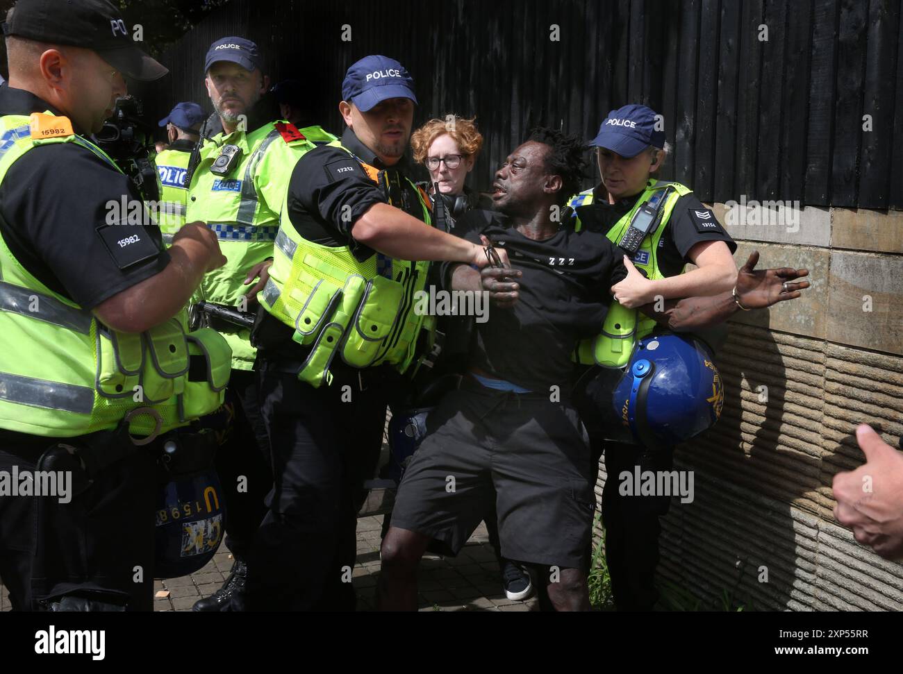 Manchester, England, UK. 3rd Aug, 2024. A man is arrested following him ...