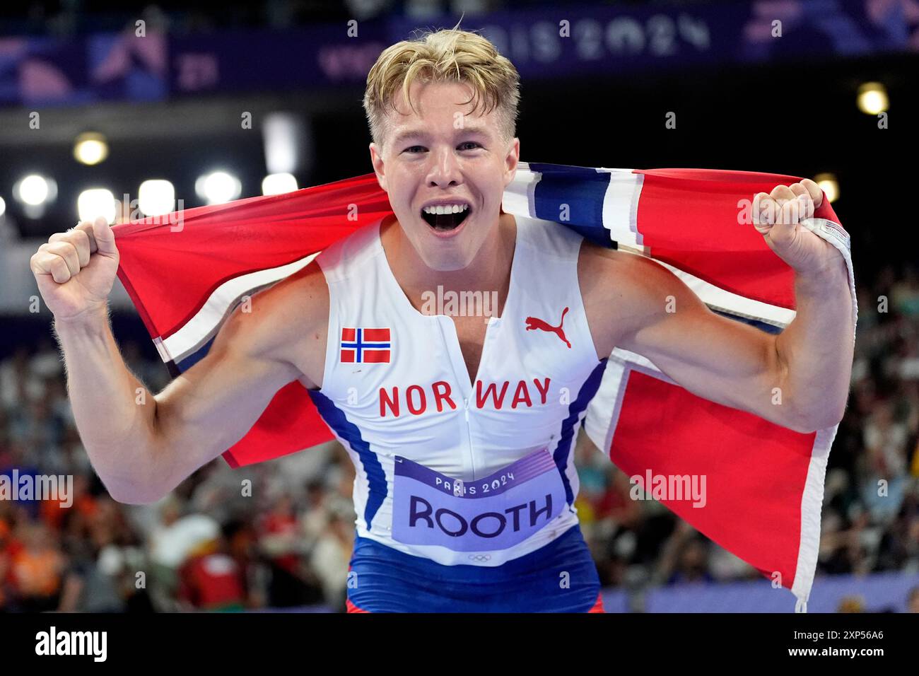 Markus Rooth, of Norway, celebrates after winning the decathlon at the ...