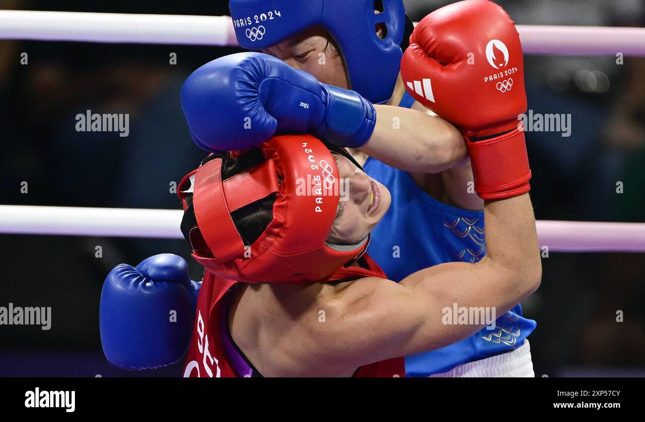 Paris, France. 03rd Aug, 2024. Belgian boxer Oshin Derieuw (red) and ...