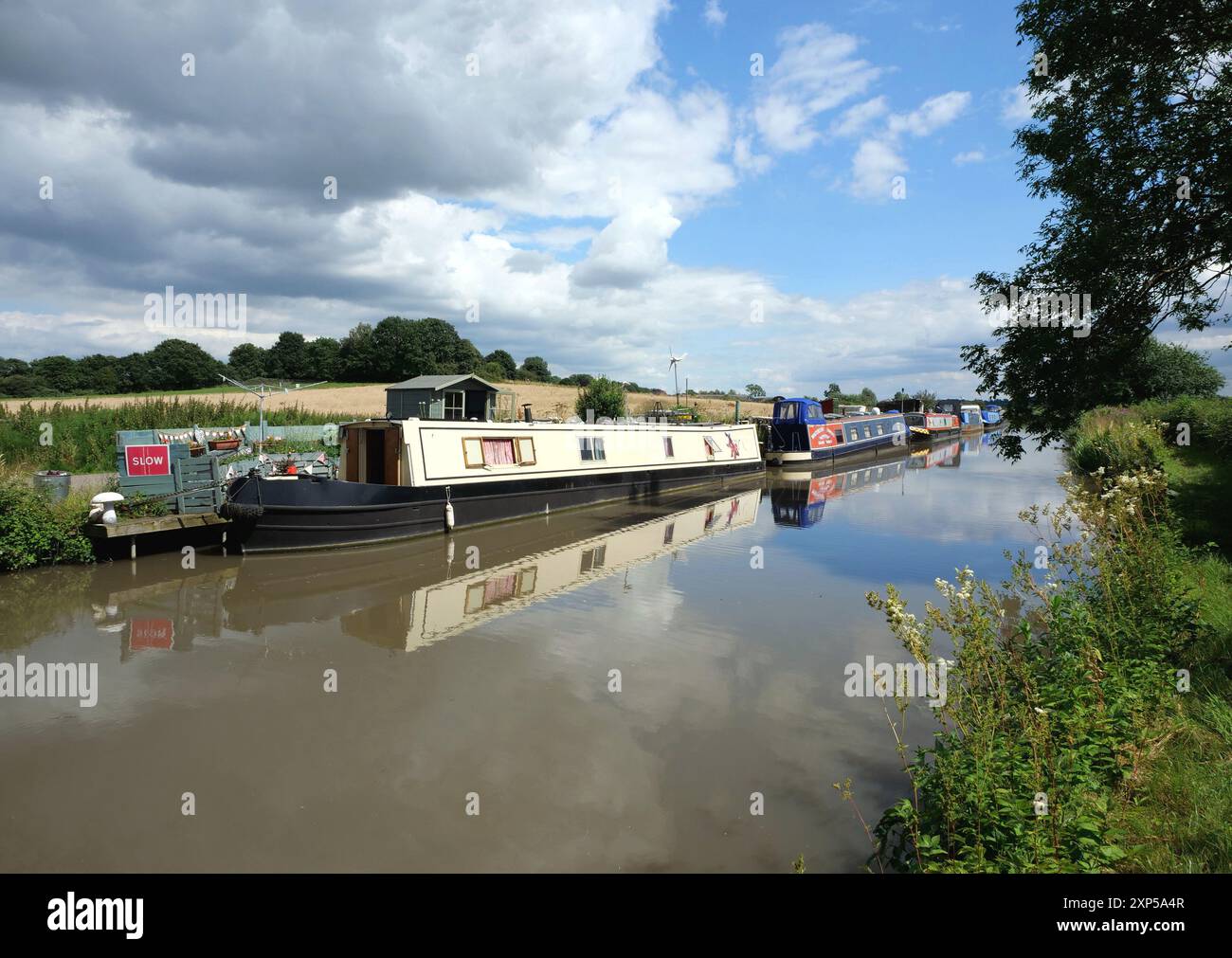 A Colourful View Of Narrowboats Along The Oxford Canal Near Ansty ...