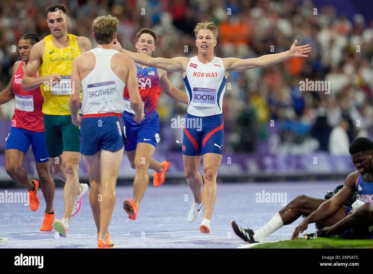 Markus Rooth, of Norway, celebrates after finishing the decathlon 1500 ...