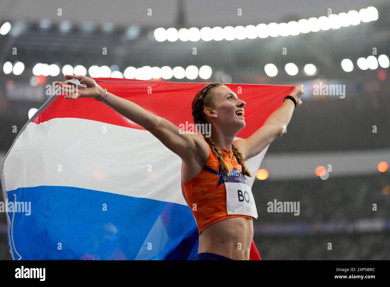 Femke Bol, of the Netherlands, celebrates after winning the gold medal ...