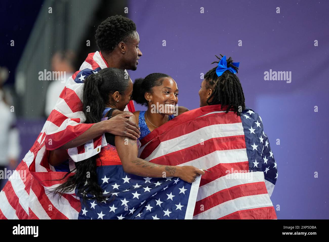United States athletes Kaylyn Brown, center, and Bryce Deadmon, left ...