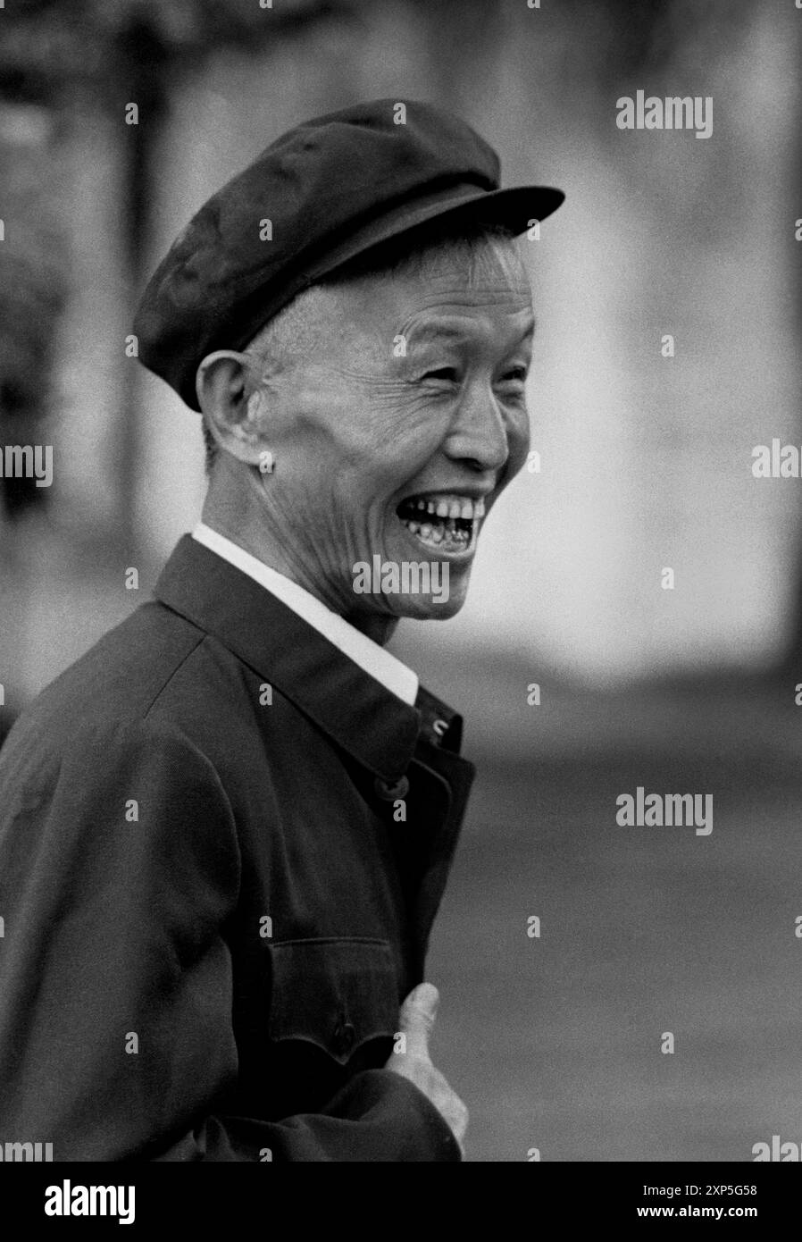 A happy man wearing a Mao suit on Nation Day in Kunming China before ...