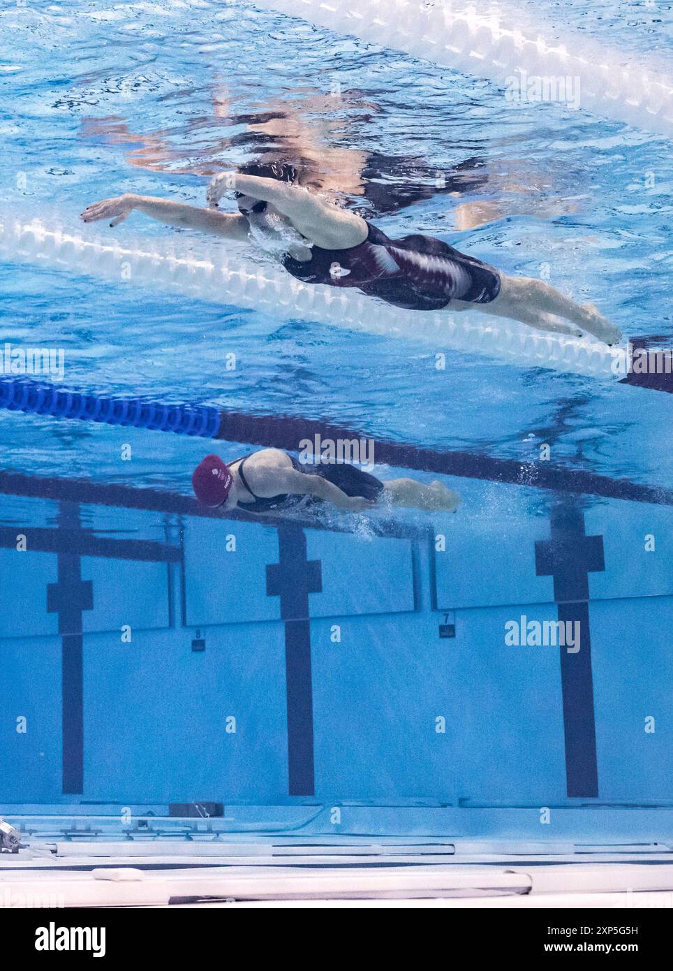 Paris, France. 3rd Aug, 2024. Summer McIntosh (top) of Canada competes ...