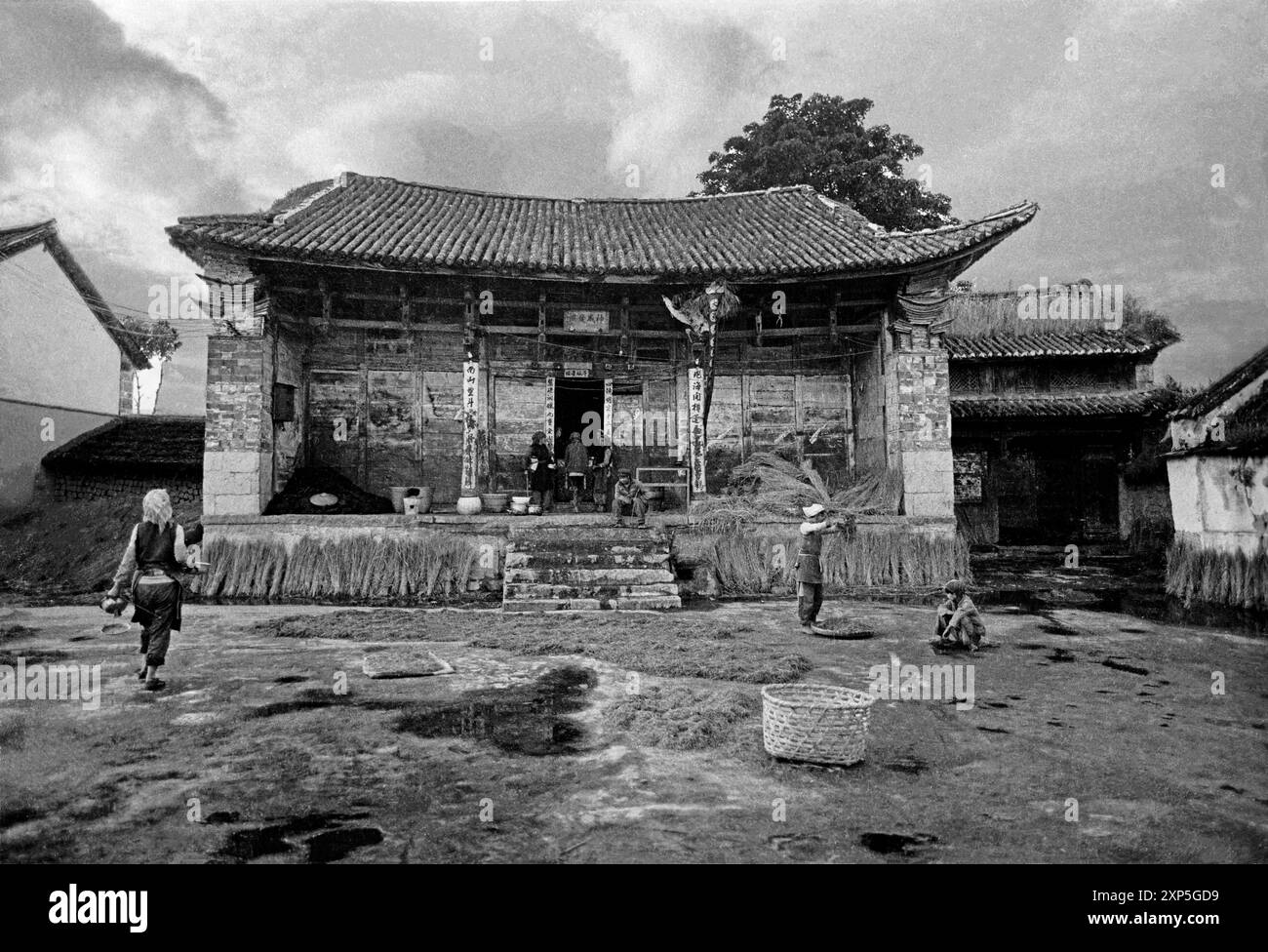 Local Yi tribe members at a temple in the rural village of Dali China ...