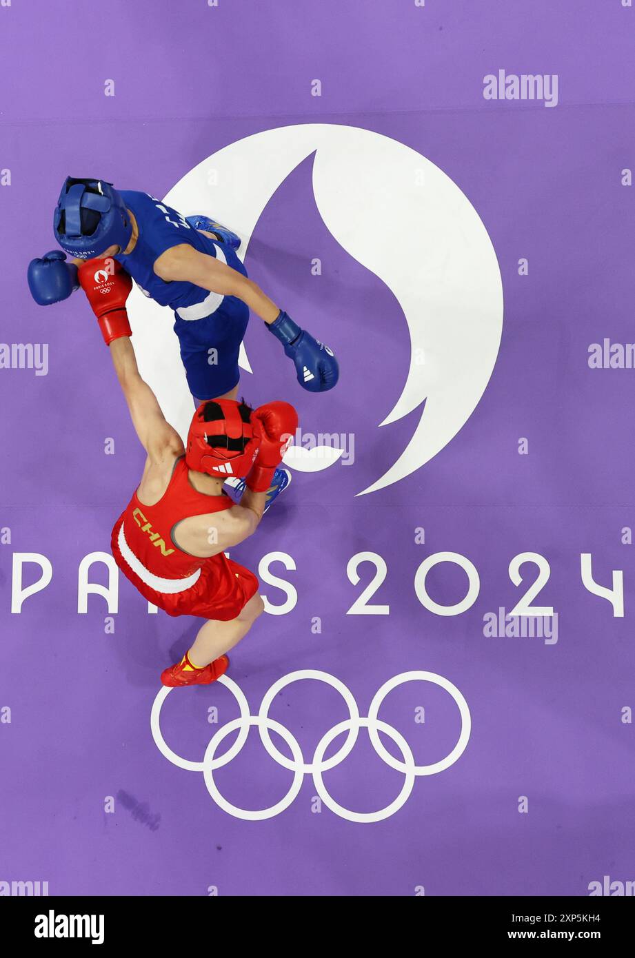 Paris, France. 3rd Aug, 2024. Yang Wenlu (bottom) of China competes ...