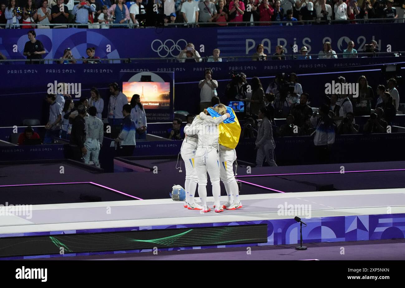 Members of Ukraine celebrate after winning the gold medal in the women ...