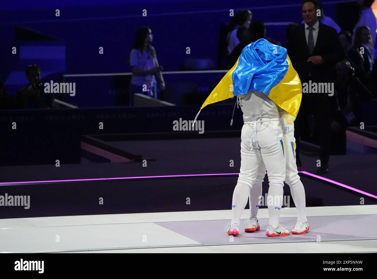 Members of Ukraine celebrate after winning the gold medal in the women ...
