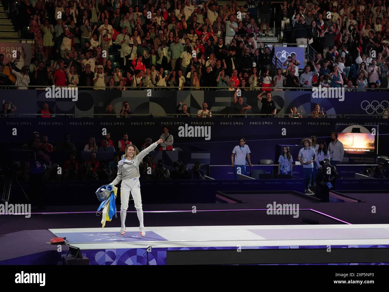 KHALAN Olga of Ukraine waves her hand after winning the gold medal in ...
