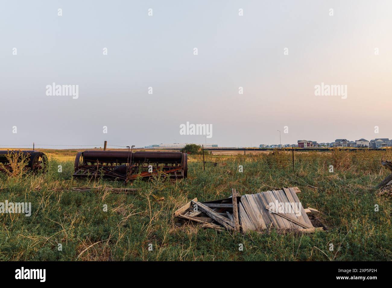 Abandoned farm ruins with barns and agriculture equipment in the ...
