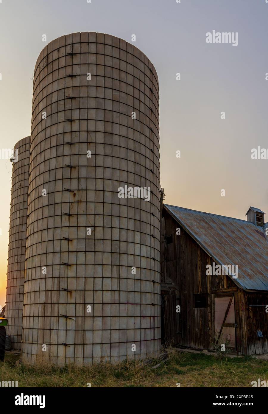 Abandoned farm ruins with barns and agriculture equipment in the ...