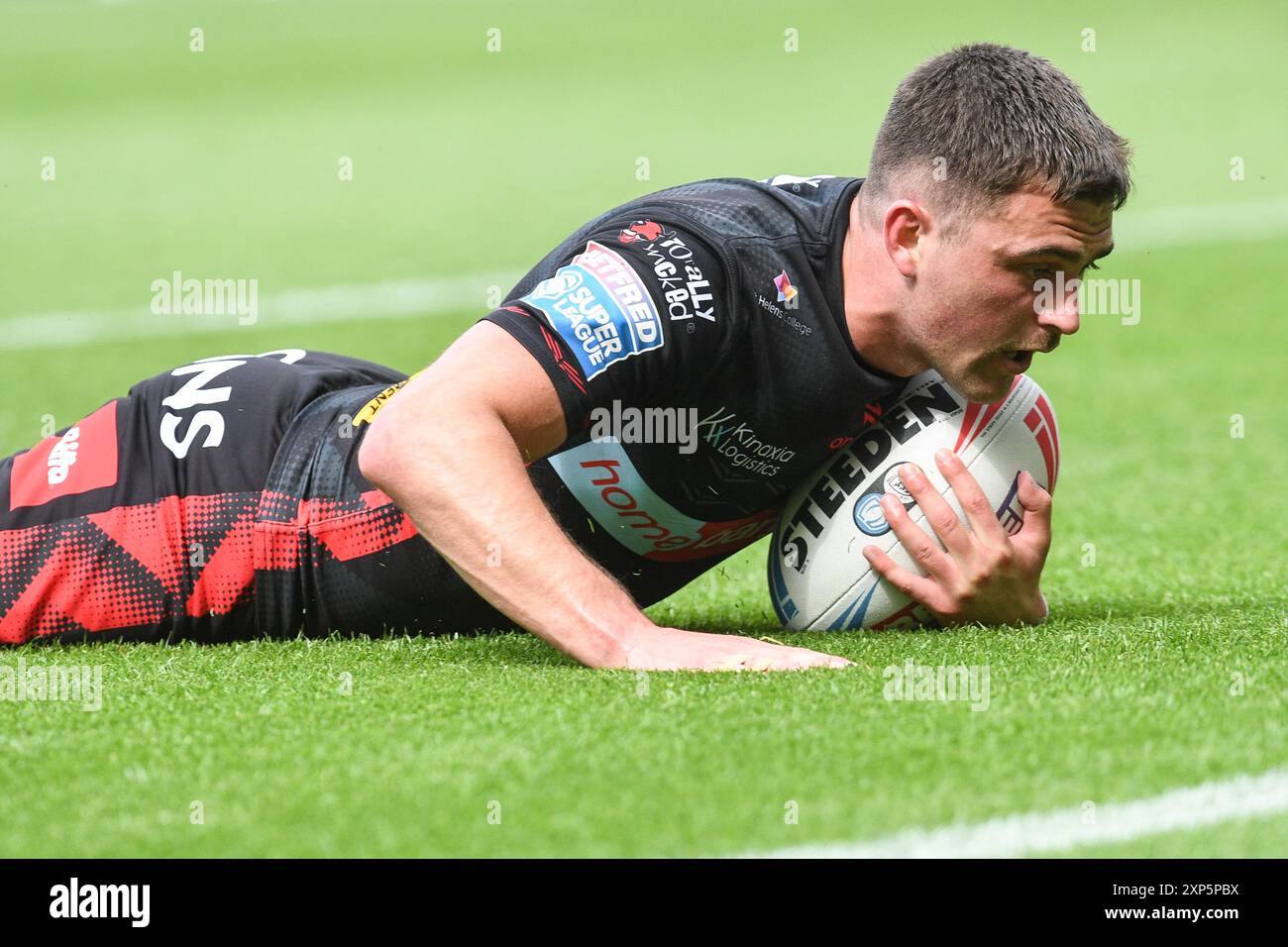 Hull, England - 3rd August 2024 - Lewis Dodd of St Helens scores try ...