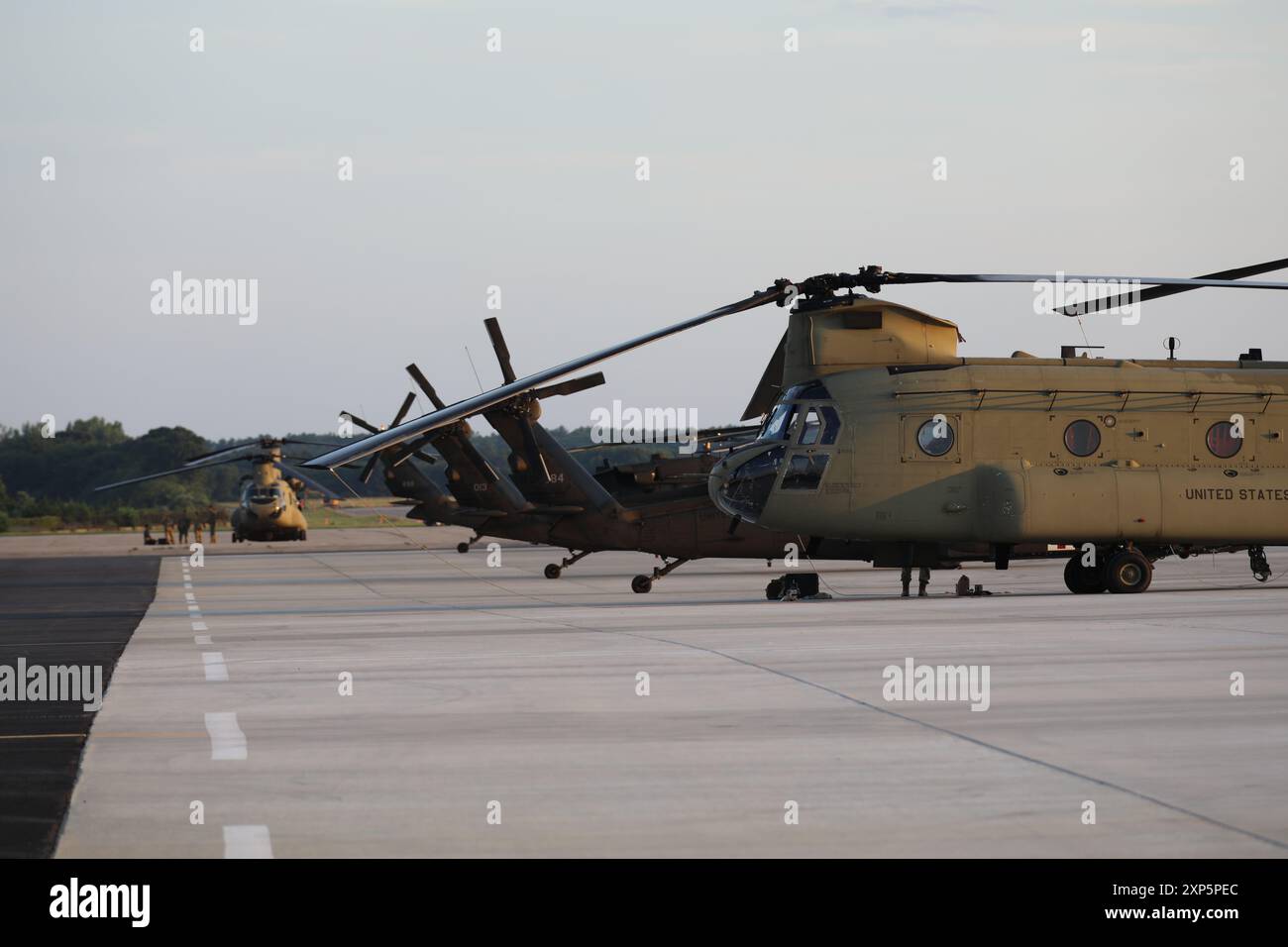 Army National Guard UH-60 and CH-47 helicopters undergo pre-flight ...