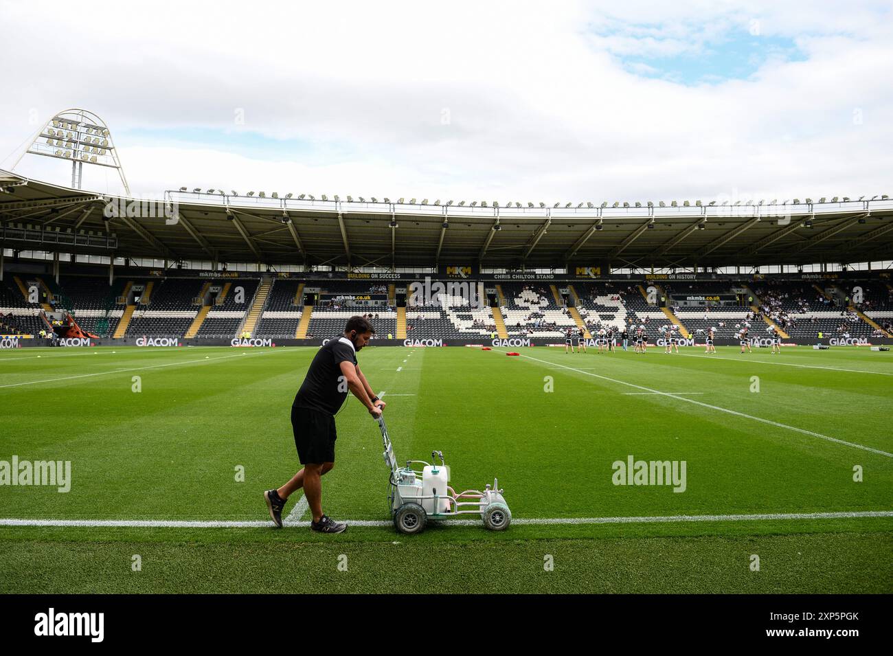 Hull, England - 3rd August 2024 - Ground keeper marks out white lines ...