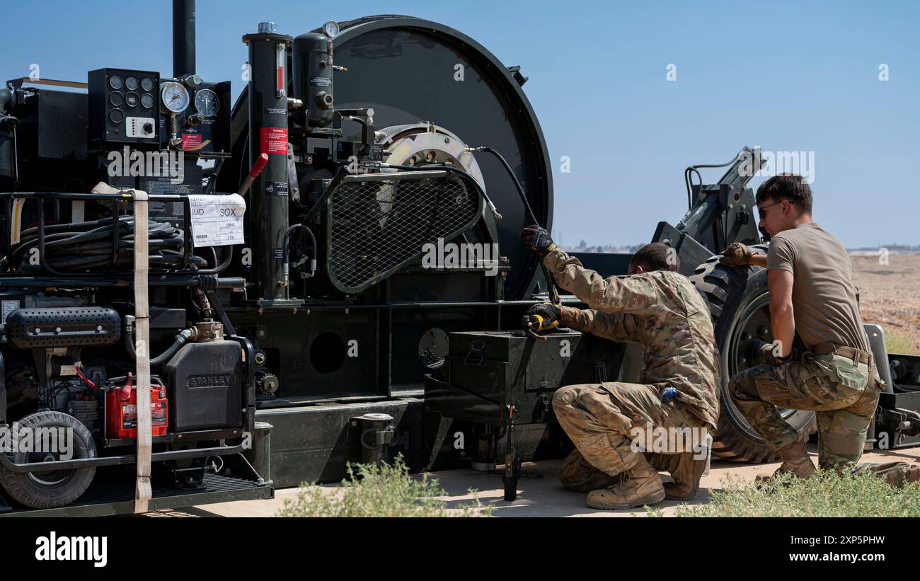 U.S. Air Force Airmen, assigned to the 332d Expeditionary Civil ...
