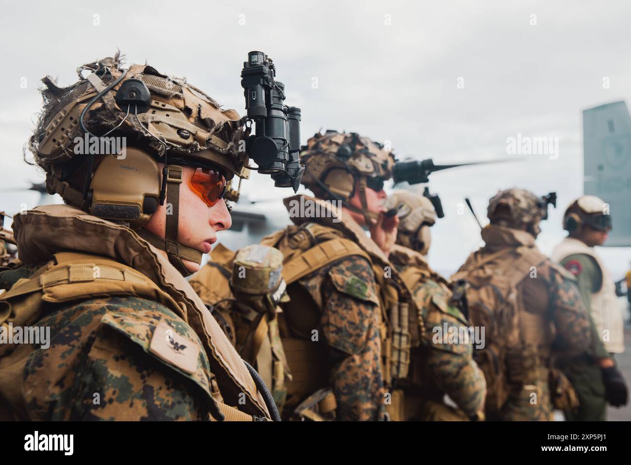 U.S. Navy Hospital Corpsman 3rd Class Sydney Mack, left, assigned to ...