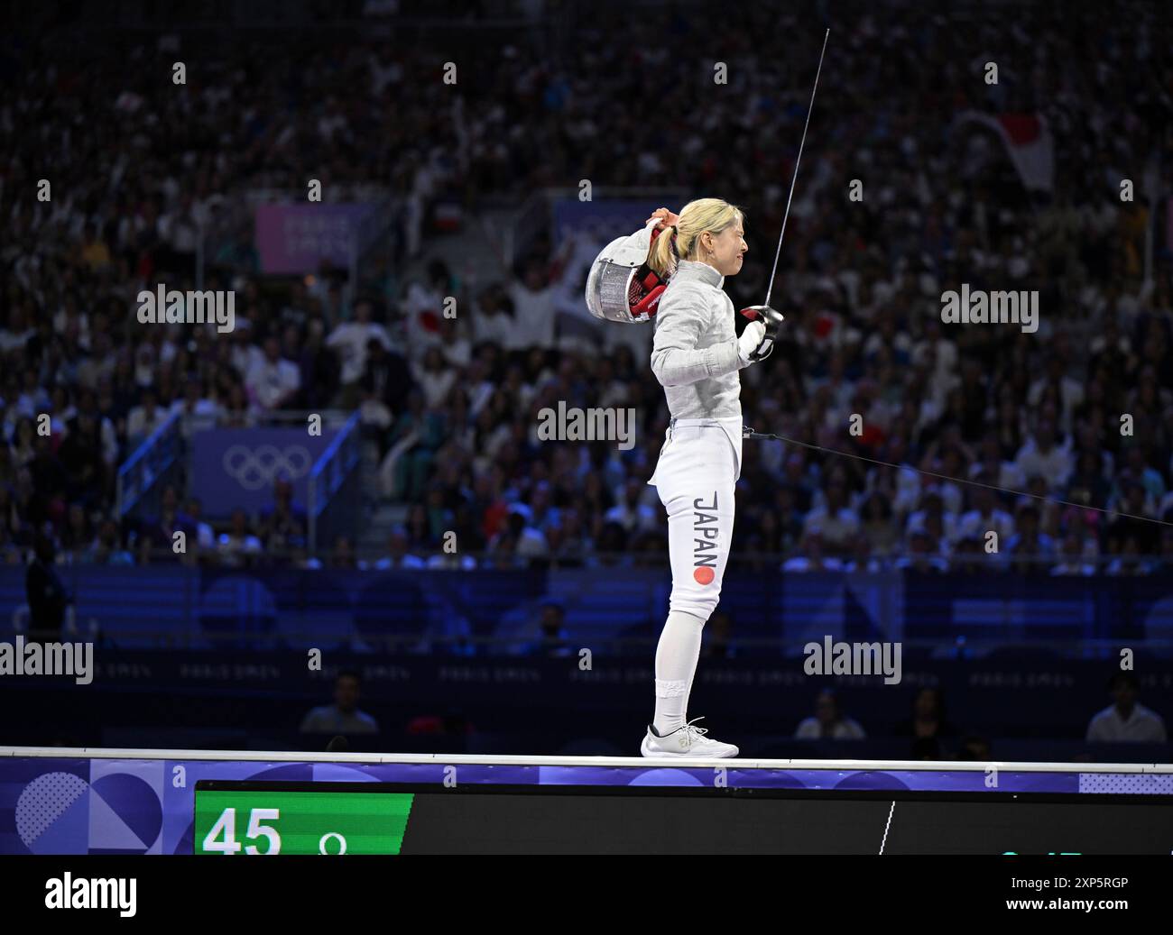 EMURA Misaki of Japan reacts after winning the women's fencing sabre ...