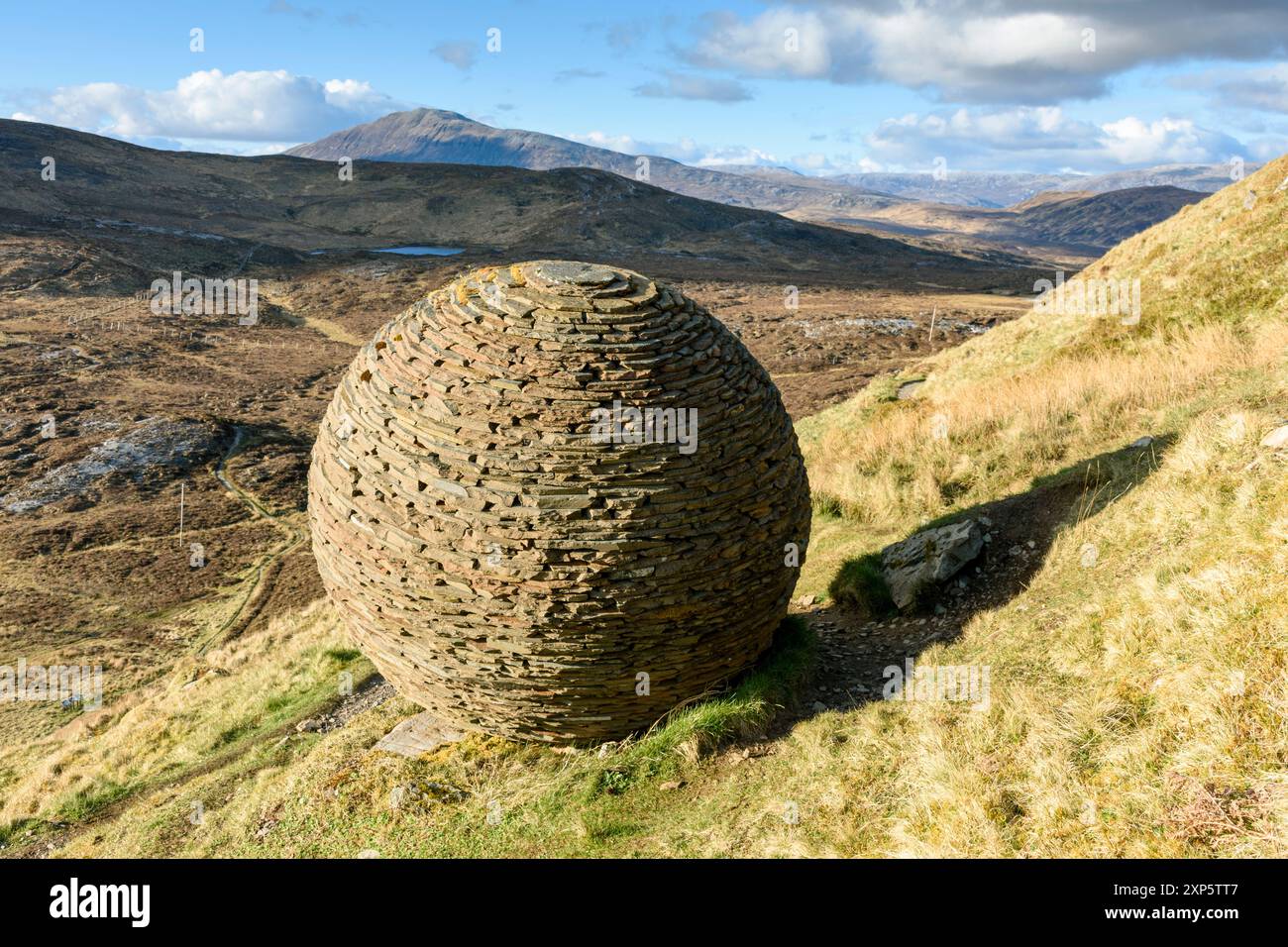 Tilted Globe, a sculpture by Joe Smith, on the Knockan Crag trail ...