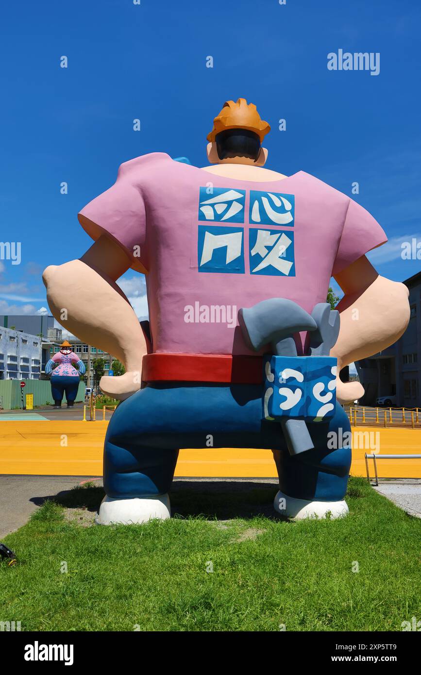 Construction Man figure on Pier 2, Kaohsiung, Taiwan Stock Photo - Alamy