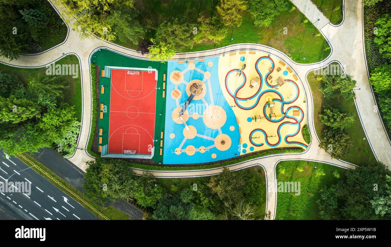 Aerial View of Urban Park Featuring Basketball Court and Water ...
