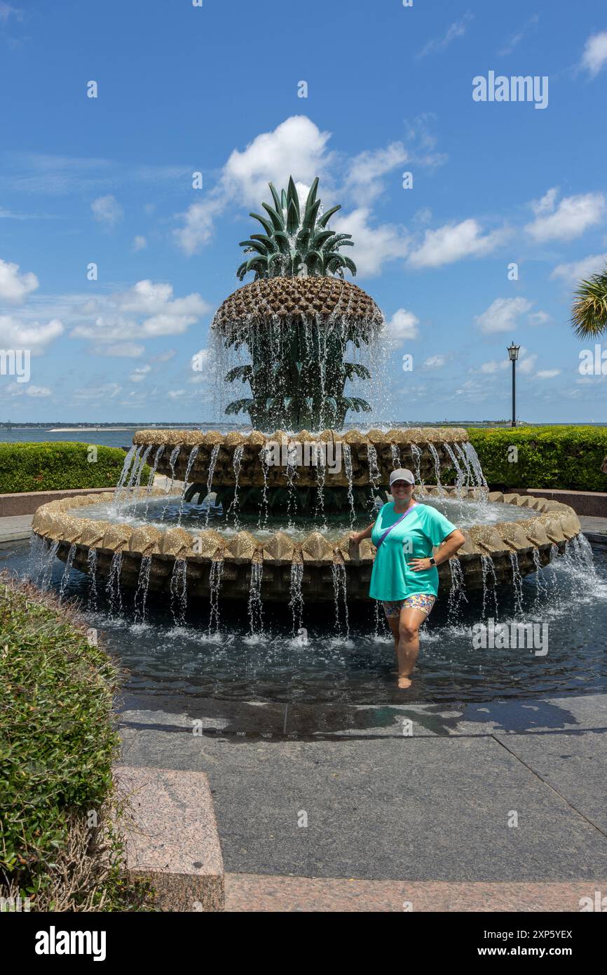 Woman Posing in Pineapple Fountain at The Battery, Charleston, South ...