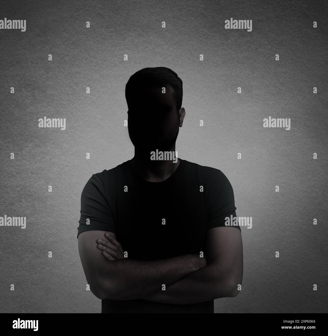 Anonymous person. Shaded portrait of man on grey gradient background ...