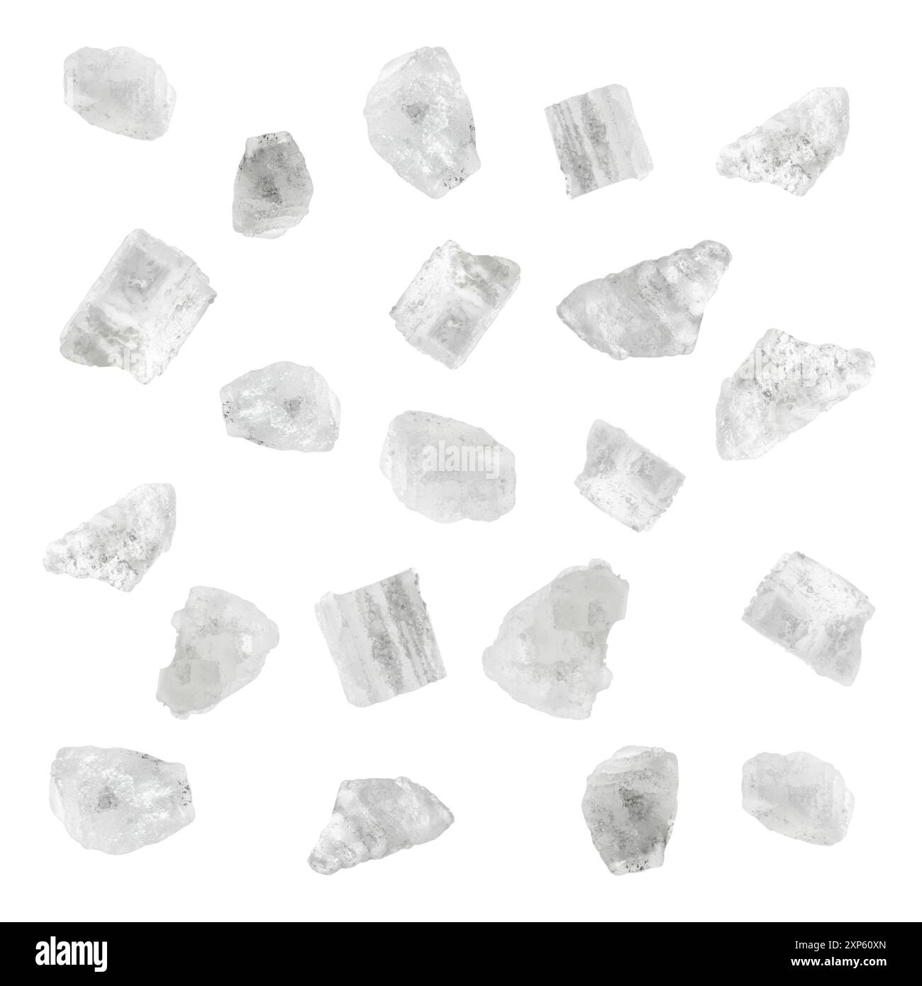 Sea salt crystals in air on white background Stock Photo - Alamy