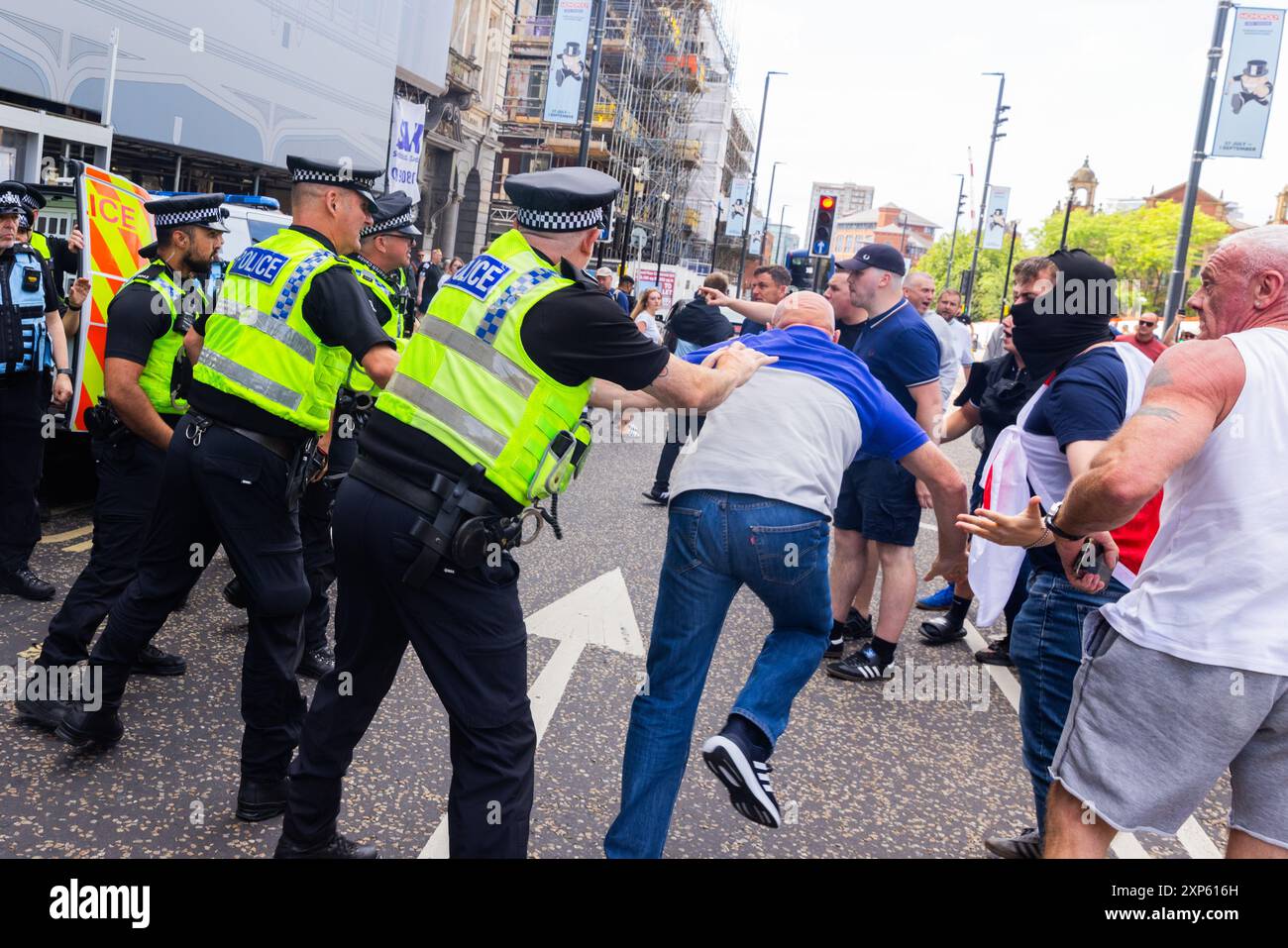 Leeds, UK. 03 AUG, 2024. Demonstrators clash with police following male ...