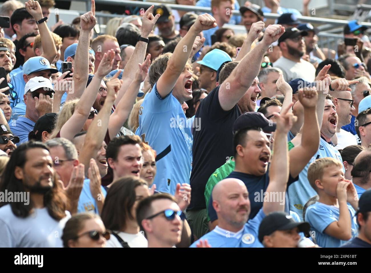 Chelsea fans cheer on their team hi-res stock photography and images ...