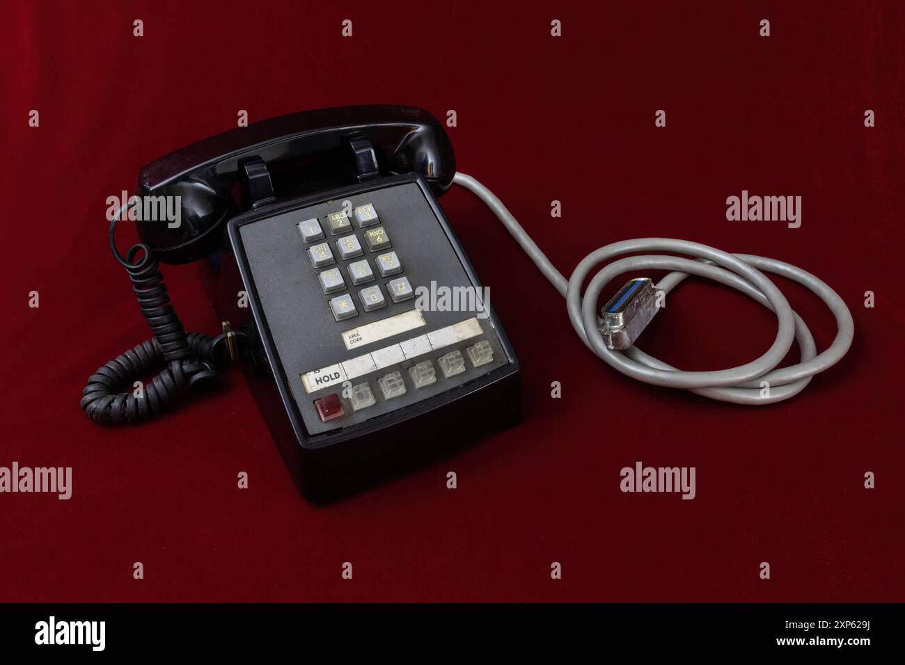 Touchtone multi-line desk telephone, circa 1970. Black bakelite. Red ...