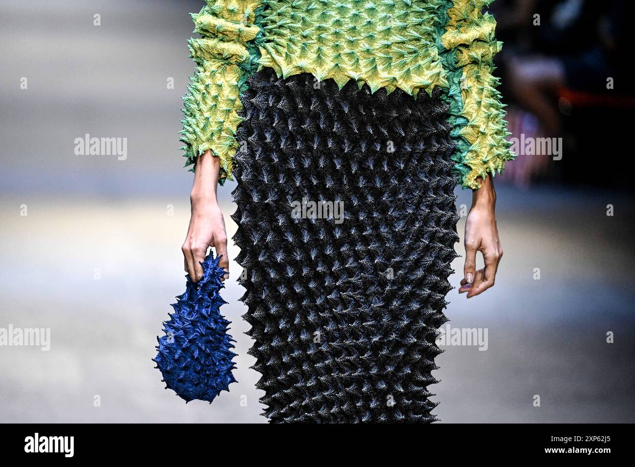 Tangerang, Indonesia. 3rd Aug, 2024. A model presents a creation of ...